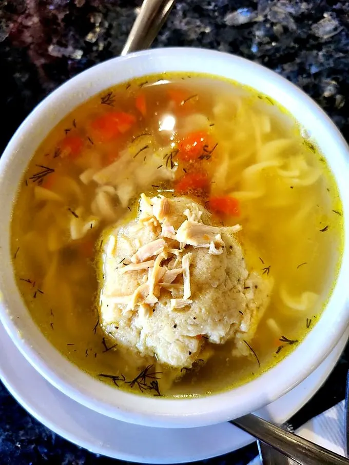 Jewish penicillin, Florida-style! This matzo ball soup is like a warm hug from your bubbe, with a side of sunshine and palm trees.