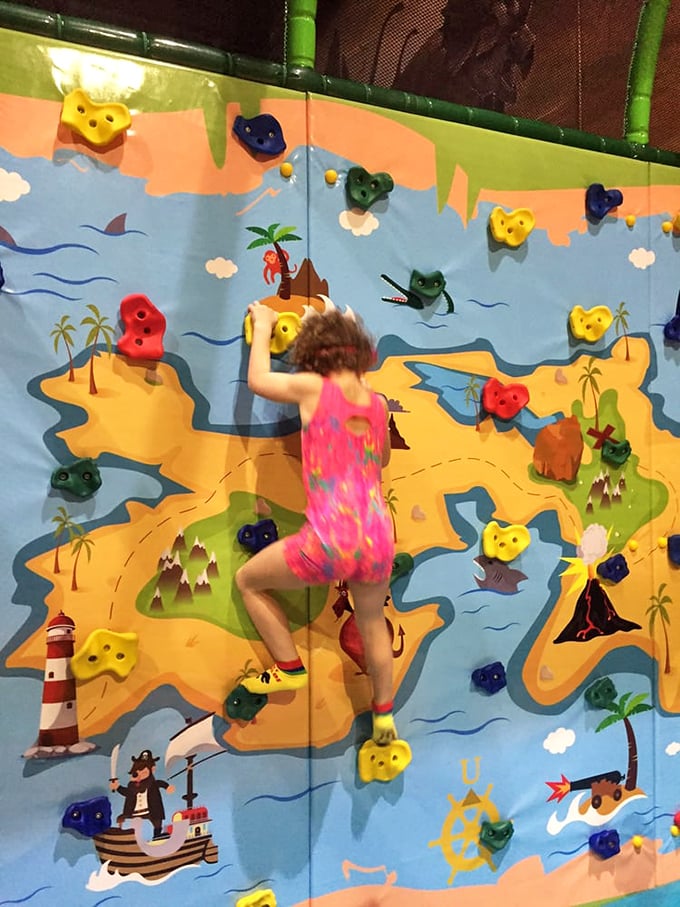 Who needs Everest when you've got this colorful climbing challenge? It's a vertical voyage through time, with each hold bringing you closer to paleontological perfection.