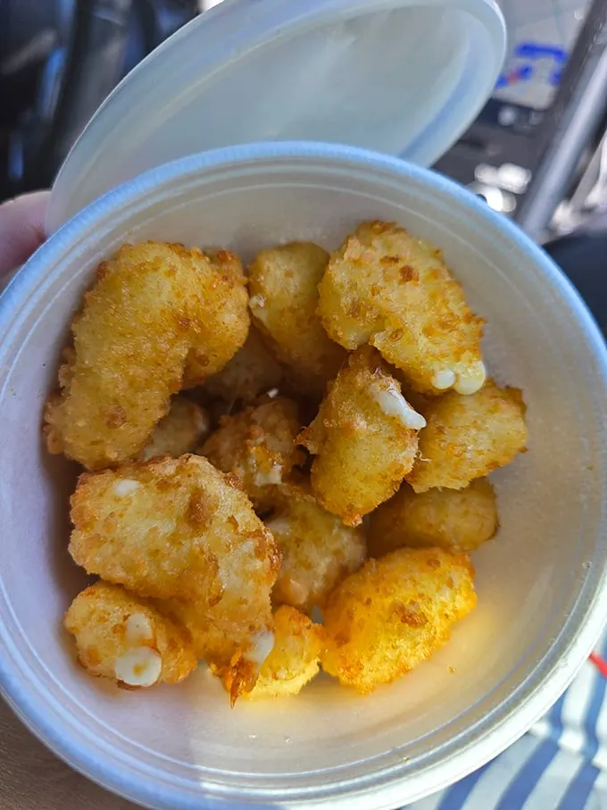 Cheesy does it! These golden curds are like little nuggets of happiness, perfect for popping and impossible to stop.