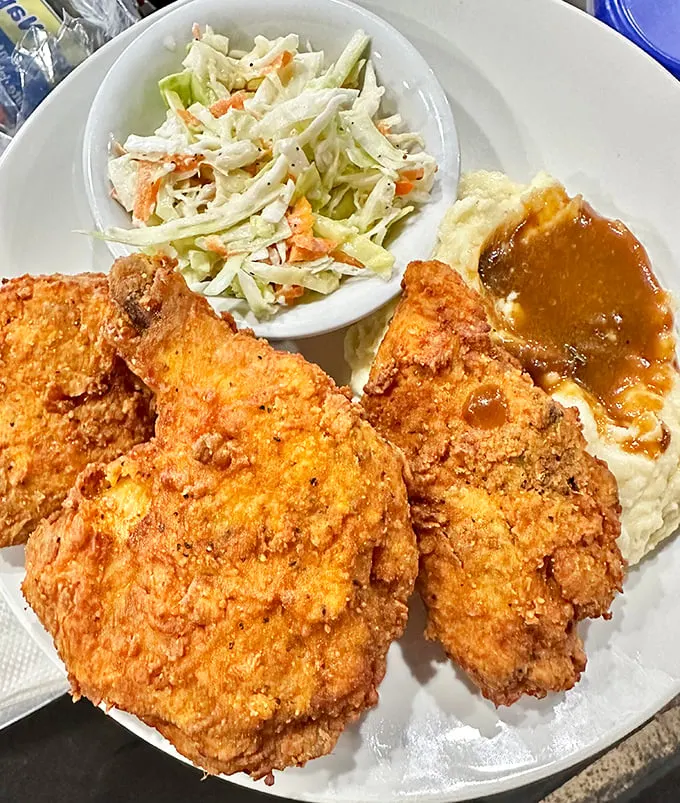 Behold the star of the show – Rossy's famous fried chicken. Golden, crispy, and more addictive than your favorite binge-worthy TV series.