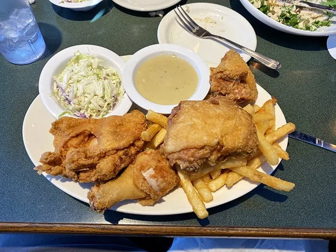 Colonel Sanders, eat your heart out! This fried chicken's so golden and crispy, it deserves its own Olympic medal. Finger-lickin' good doesn't even begin to cover it.