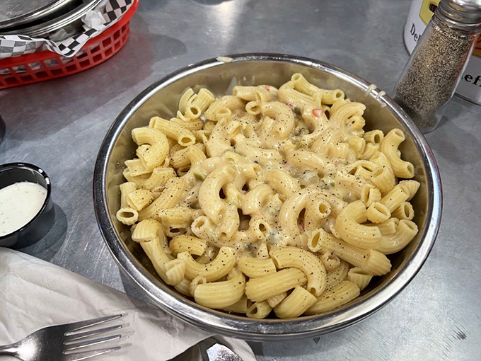 Mac and cheese so creamy, it could make a lactose intolerant person weep with joy. It's comfort food that hugs your insides like a warm, cheesy blanket.