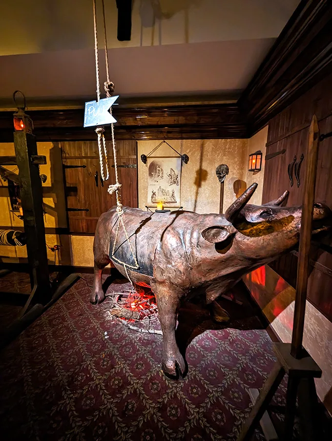 Holy cow! This bronze beast gives new meaning to the phrase "feeling the heat." Talk about an over-engineered BBQ!