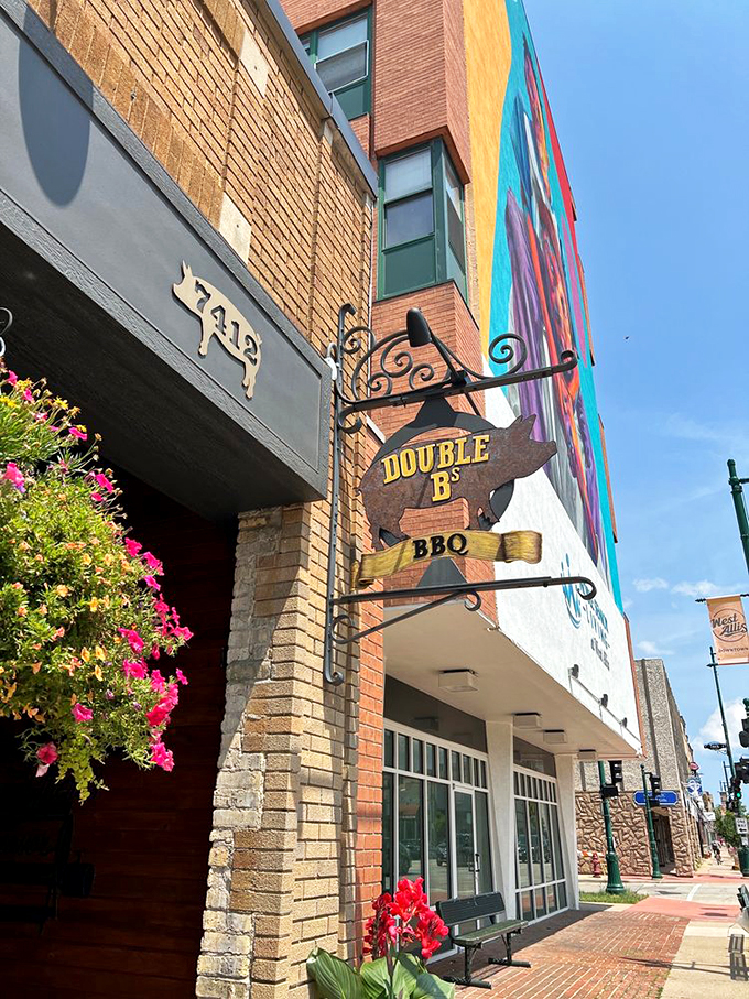 Follow the pig to pork paradise! This sign is like a beacon of hope for the hungry, guiding weary travelers to the promised land of BBQ.
