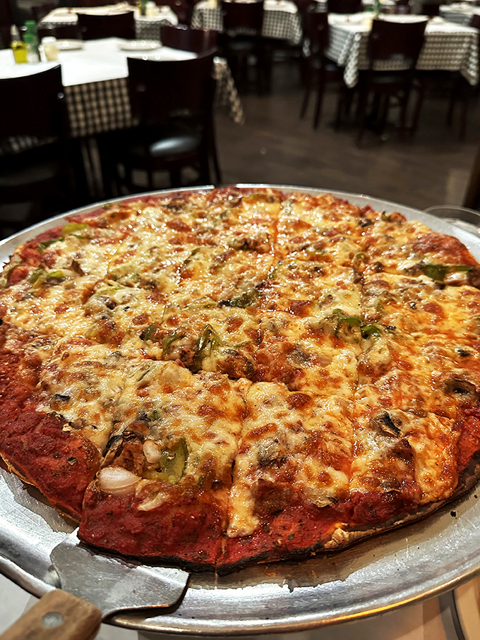 Crispy, cheesy, and utterly irresistible. This tavern-style pizza is so good, it might just settle the deep dish vs. thin crust debate once and for all.