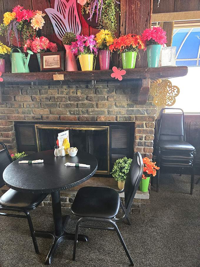 Cozy corner alert! This fireplace setup is begging for a long chat over coffee and coconut cake. Hygge, Midwest-style.