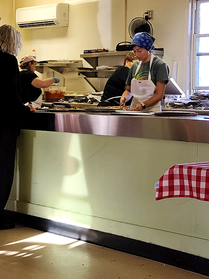 Pizza artists at work! These culinary Picassos craft each pie with the care and precision of a Swiss watchmaker.