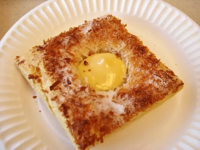 "Sunny side up, pastry style!" This egg-topped treat is like breakfast and dessert had a delicious love child. Talk about starting your day right!