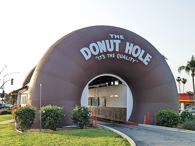 Step right up to donut nirvana! This entrance is like a portal to a world where calories don't count and sugar is a food group.
