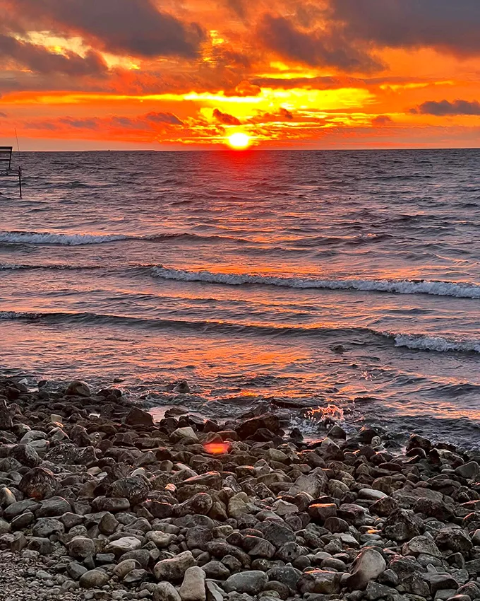 Sunset spectacular: Door County's rocky shore provides front-row seats to nature's nightly light show over Lake Michigan.