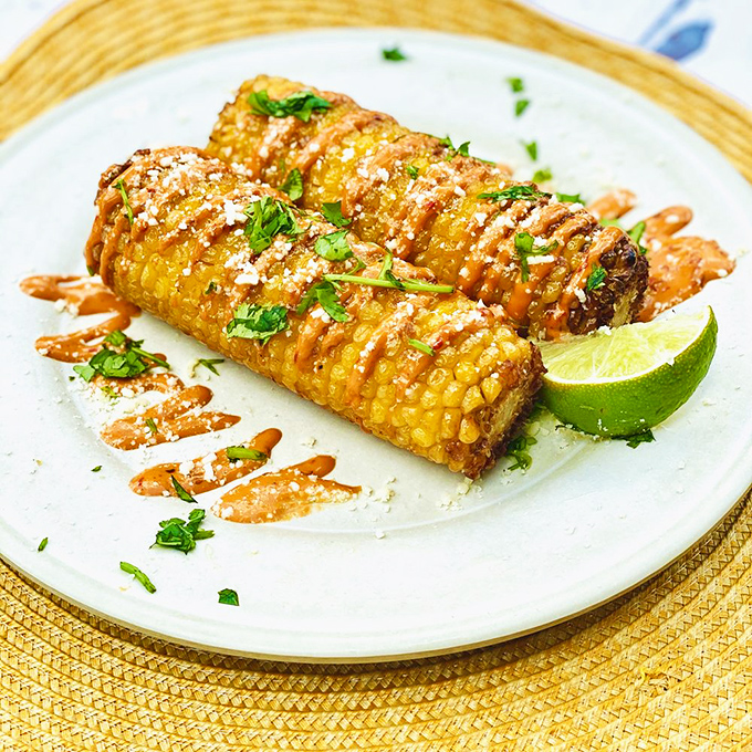 Corn-ucopia of flavor! This elote is dressed up and ready to party, bringing street food chic to your plate.