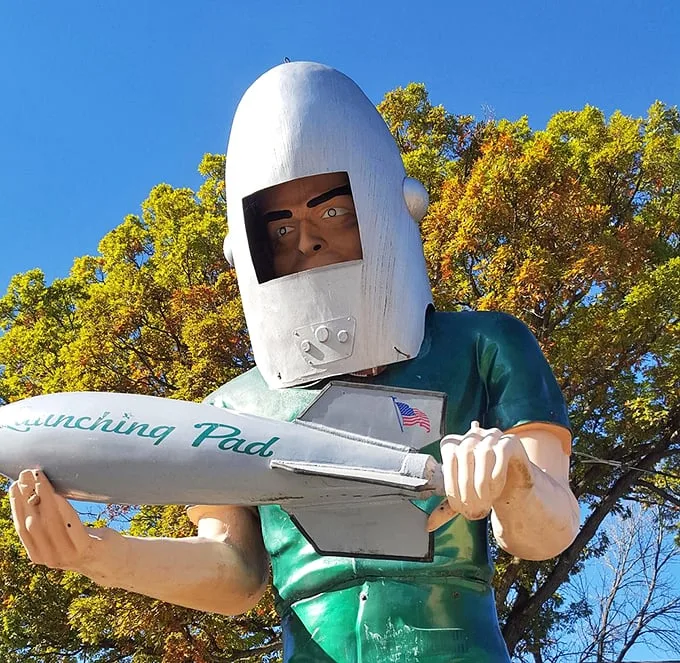 Autumn leaves and alien beings – just another day in Illinois. Who needs New England fall foliage when you've got technicolor trees and a green giant?