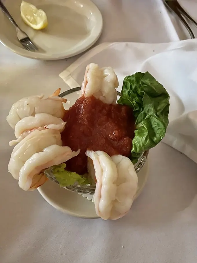 Sea-food, eat food! This shrimp cocktail, with its plump crustaceans and zesty sauce, is an oceanic orchestra of flavors. Dive in!