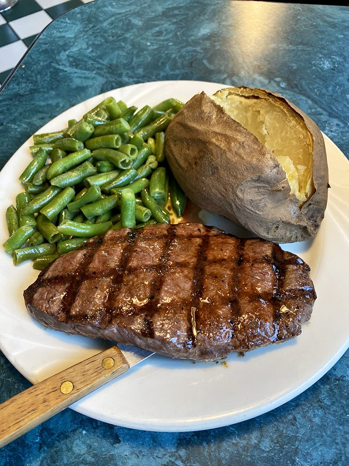 This steak's so perfectly grilled, it could make a vegetarian weep. Pair it with those green beans for a balanced meal... sort of.