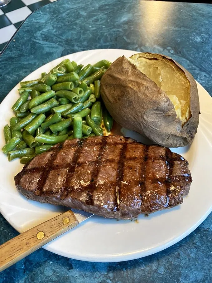 This steak's so perfectly grilled, it could make a vegetarian weep. Pair it with those green beans for a balanced meal... sort of.
