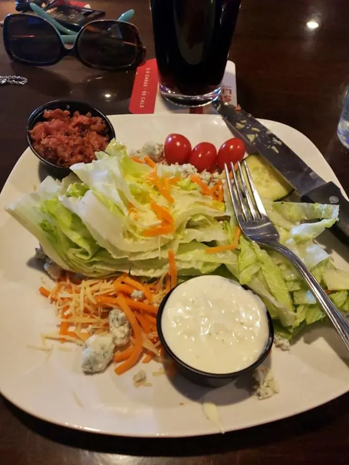 Crisp, cool, and loaded with flavor! This wedge salad is like a refreshing iceberg in a sea of hearty steaks – the Titanic wishes it hit this instead.