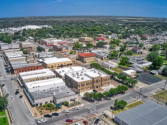 Aerial view: Cuero from above – where Norman Rockwell meets Google Earth. This bird's-eye view showcases the town's perfect blend of charm and modernity.