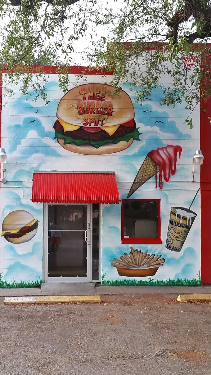 A mural that speaks to the soul! It's like Picasso decided to paint his masterpiece, but got distracted by a really good cheeseburger.