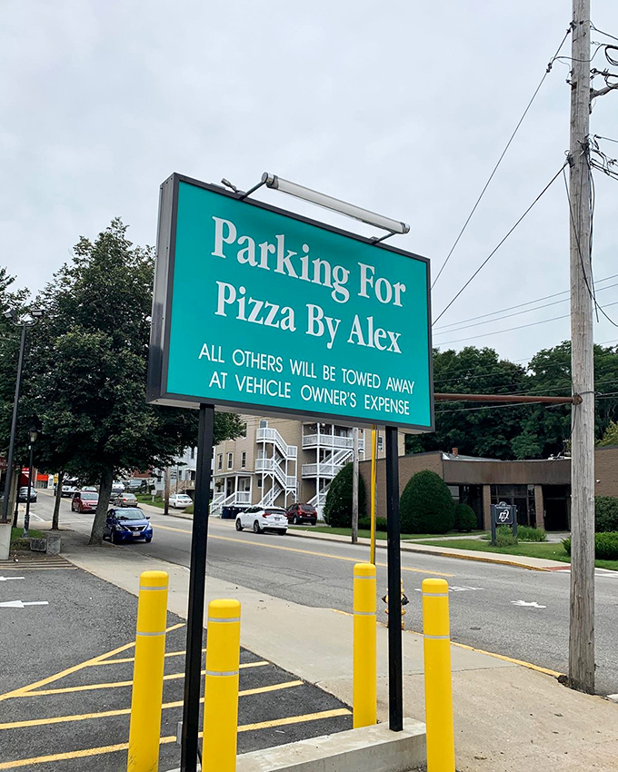The most welcoming "Keep Out" sign you'll ever see. It's not just parking - it's a VIP spot for your vehicle while you feast!