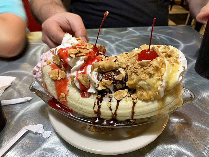 A banana split that's bigger than my childhood dreams of becoming an astronaut. It's a sugary masterpiece that would make Willy Wonka jealous.
