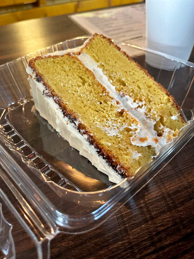 The grand finale: a slice of heaven. This cake is so moist and fluffy, it might just float right off your plate.