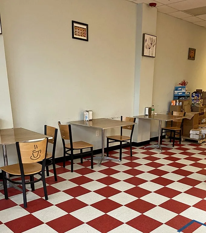 Retro vibes and sugar highs! The cozy dining area invites you to sit, savor, and contemplate the meaning of life (it's donuts).
