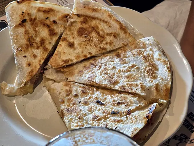 Quesadillas: the perfect food for when you can't decide between a sandwich and a pizza. Crispy, cheesy, and utterly irresistible.