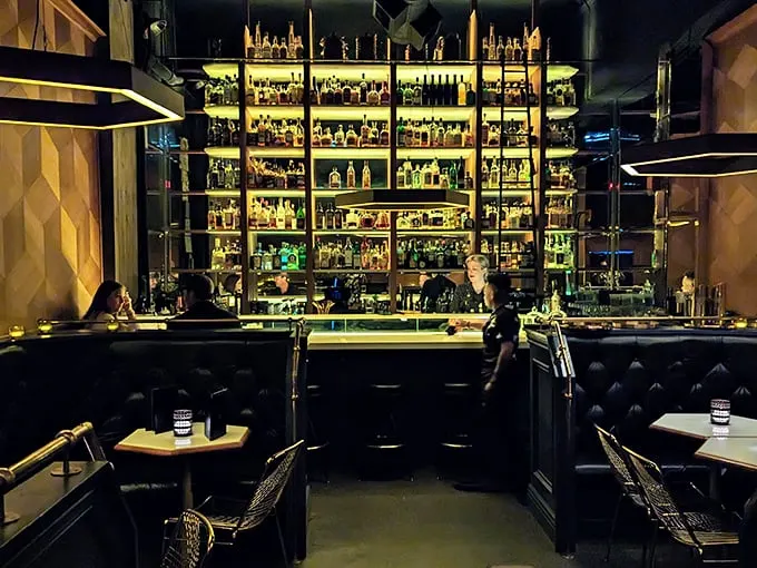 Step into liquid luxury! Bad Luck Bar's gleaming shelves promise libations that would make even James Bond swoon.