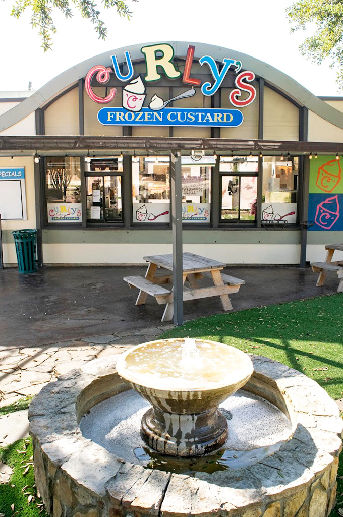 Picnic tables and pastel hues? Curly's isn't just serving custard; it's dishing out pure, unadulterated joy in Fort Worth.