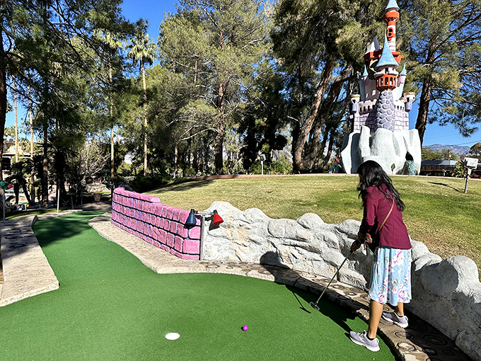 Entering Golf N' Stuff is like stepping into a medieval fairy tale – if castles had putt-putt courses and cotton candy stands.