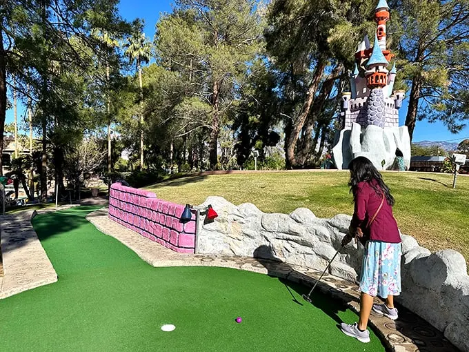 Entering Golf N' Stuff is like stepping into a medieval fairy tale – if castles had putt-putt courses and cotton candy stands.