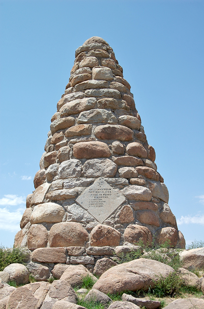 Rising like a stone sentinel against the desert sky, Ed Schieffelin's monument stands as a testament to the prospector who found silver instead of his tombstone.