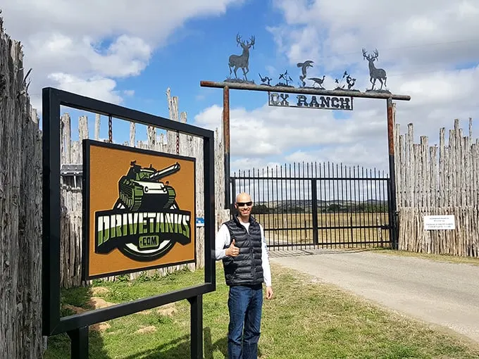 "Welcome to the Alamo of adrenaline!" The entrance to DriveTanks promises wild adventures behind its rustic gates and playful signage.