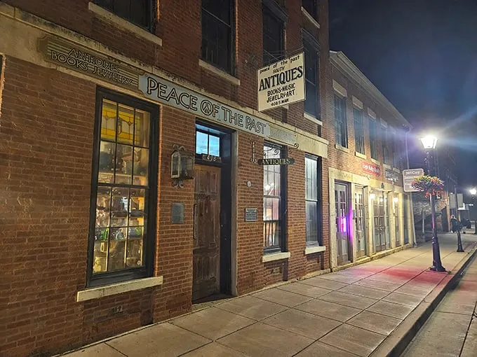 As night falls, the storefront glows like a beacon for night owls and history buffs. Who needs sleep when there are stories to uncover?