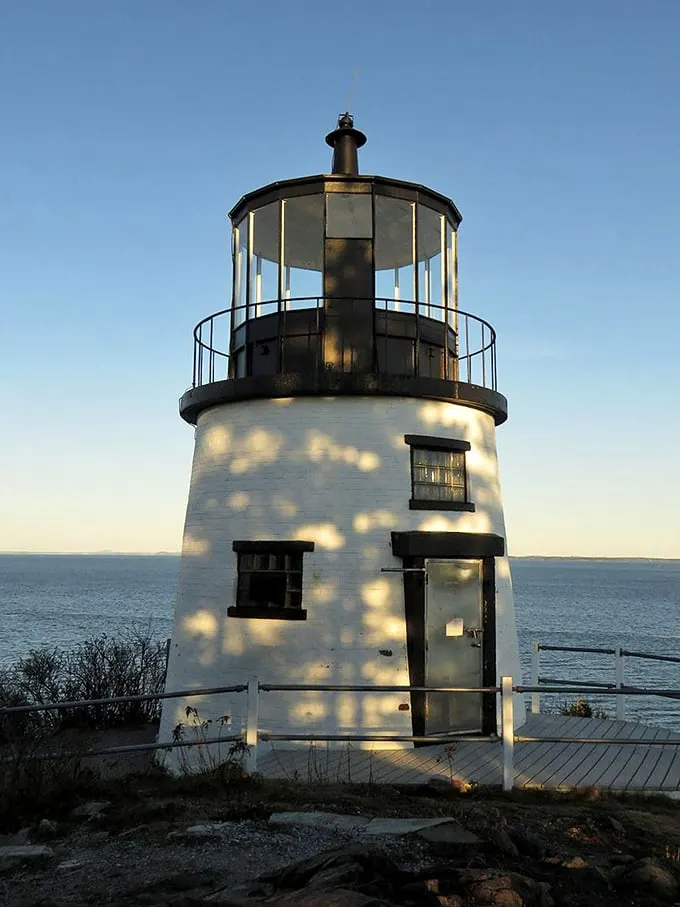 Nature's light show: Sunbeams play hide-and-seek on the lighthouse's facade, creating a dazzling display worthy of a Pixar animation.