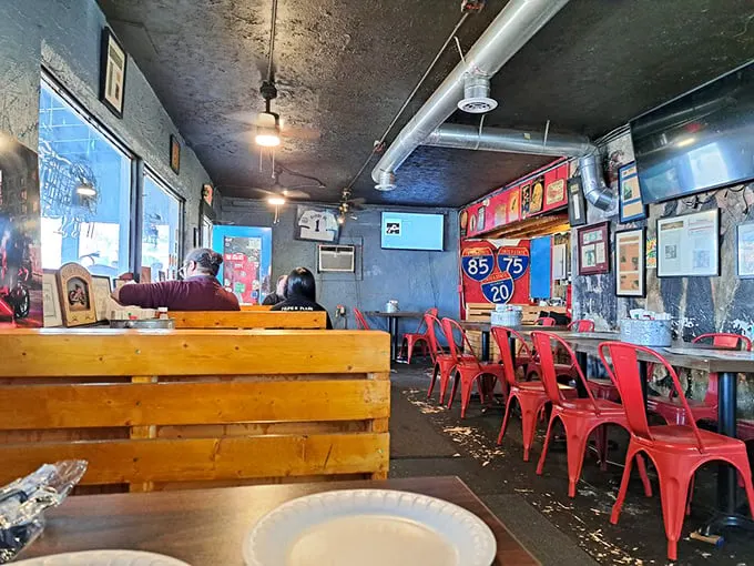 Step into a time capsule of Southern comfort. With its eclectic decor and cozy booths, this joint feels like your cool uncle's basement—if he were a barbecue master.