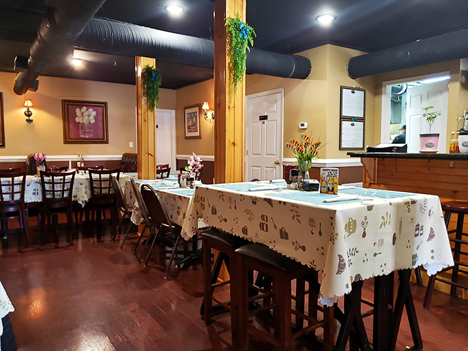 Step inside and feel the cozy vibes wash over you. With warm wood tones and charming tablecloths, it's like dining in grandma's living room – if grandma were a culinary genius.