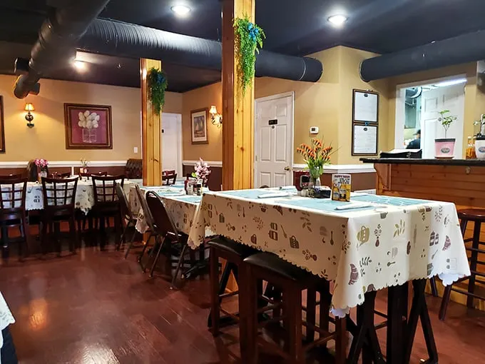 Step inside and feel the cozy vibes wash over you. With warm wood tones and charming tablecloths, it's like dining in grandma's living room – if grandma were a culinary genius.