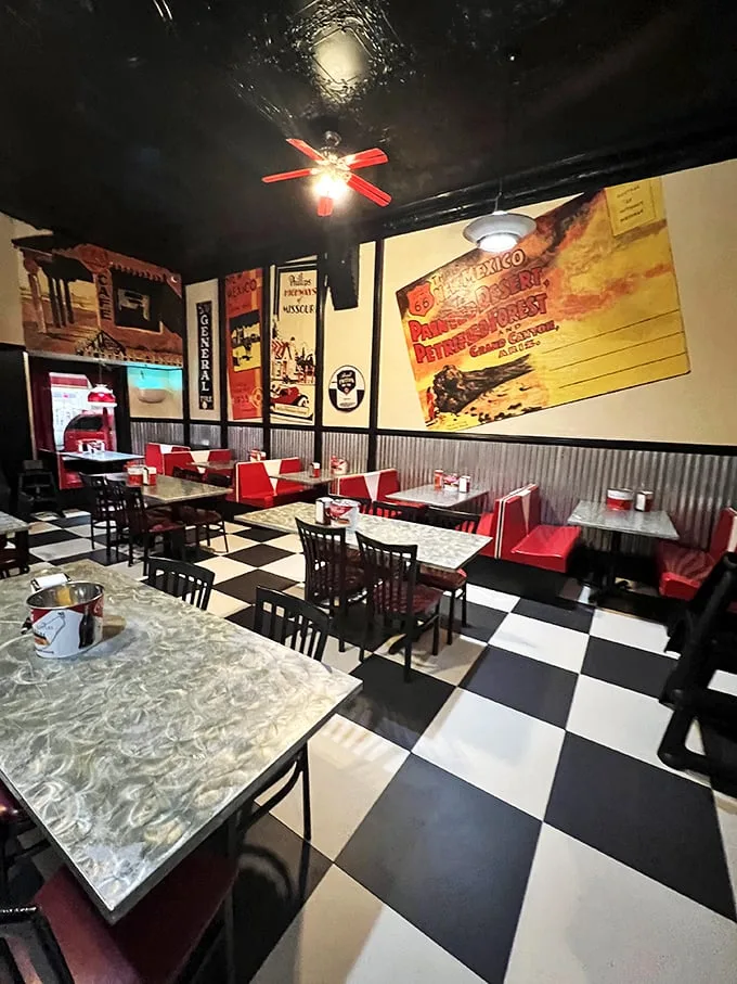 Step inside and suddenly you're Marty McFly, minus the DeLorean. The checkered floor and retro posters scream '50s louder than a jukebox full of Elvis hits.