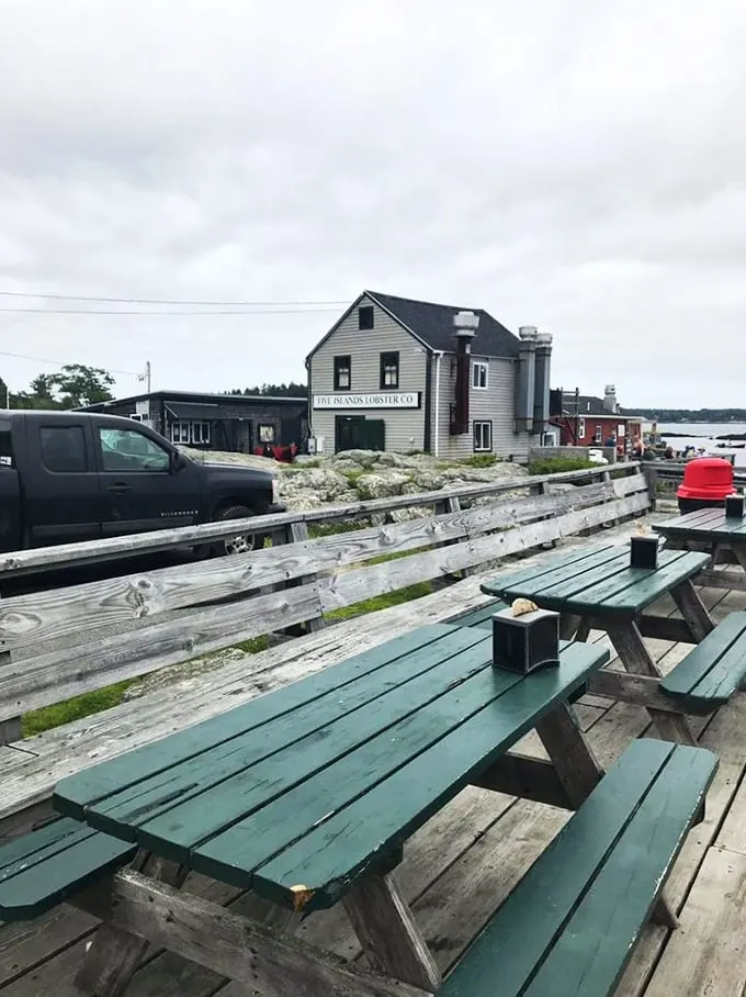 Picnic tables with a view to die for. Who needs white tablecloths when you've got this seaside spectacle?