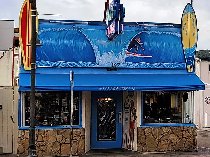 Surf's up at Splash Café! With that giant wave mural, you might need water wings just to order your meal.