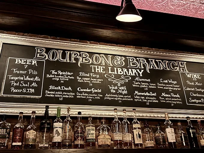 Decisions, decisions! The chalkboard menu reads like a who's who of classic cocktails and clever concoctions. Choose wisely, old sport!
