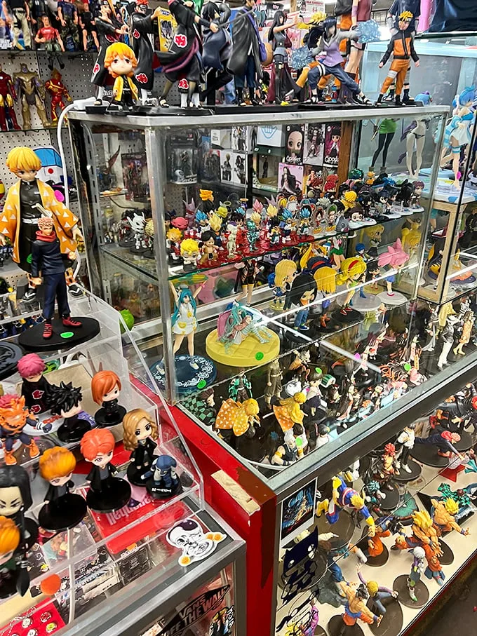 Anime aficionados, rejoice! This booth is a shrine to collectible characters, where plastic heroes stand guard over your childhood memories. It's like Comic-Con in miniature!