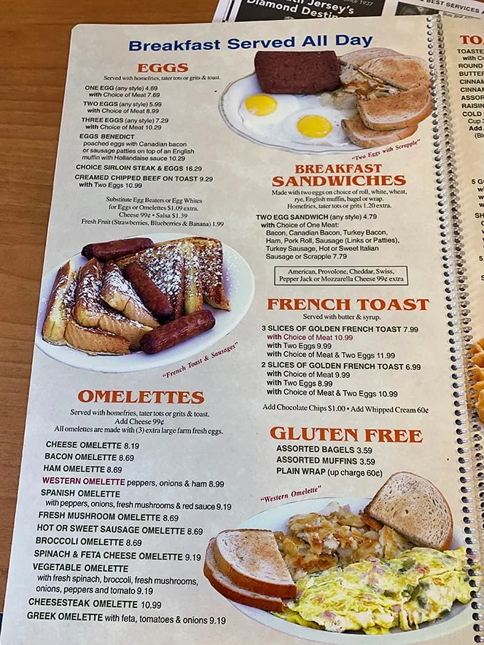 Behold, the sacred text of breakfast! This menu is a choose-your-own-adventure book where every choice leads to delicious happiness. Warning: May cause excessive drooling.