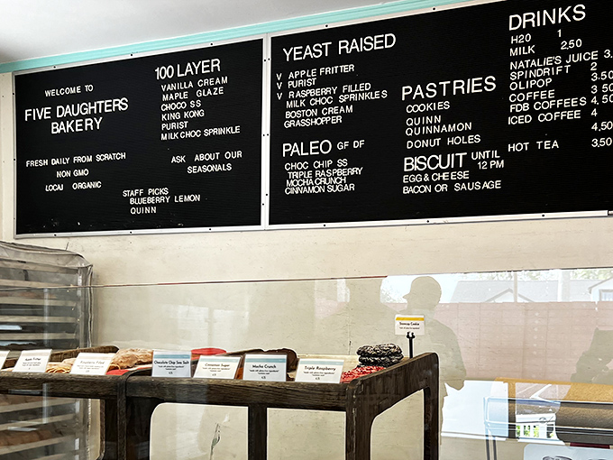 Decisions, decisions! The menu board at Five Daughters reads like a love letter to carbs, with tempting options that'll have you wishing for a bigger stomach.