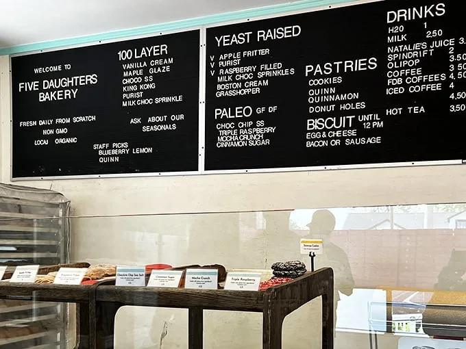 Decisions, decisions! The menu board at Five Daughters reads like a love letter to carbs, with tempting options that'll have you wishing for a bigger stomach.