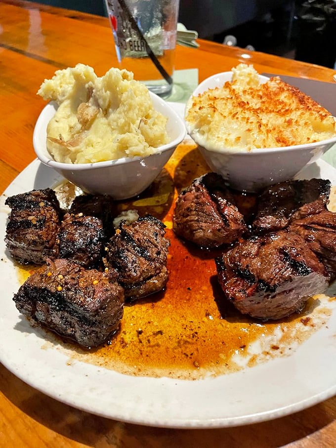 Steak tips so tender, they practically melt on your plate. Paired with creamy sides, it's comfort food that hugs your soul.