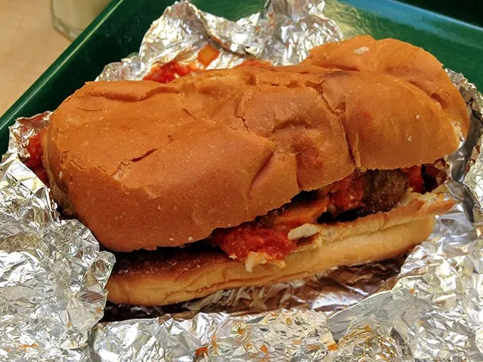 Holy meatballs, Batman! This sub is so packed, it's like the Incredible Hulk of sandwiches – bursting with flavor and ready to satisfy.