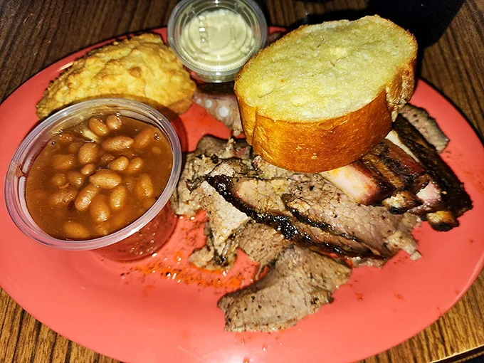 Brisket so tender, it practically slices itself! Paired with golden cornbread and beans, it's a plate that would make any Texan tip their hat.