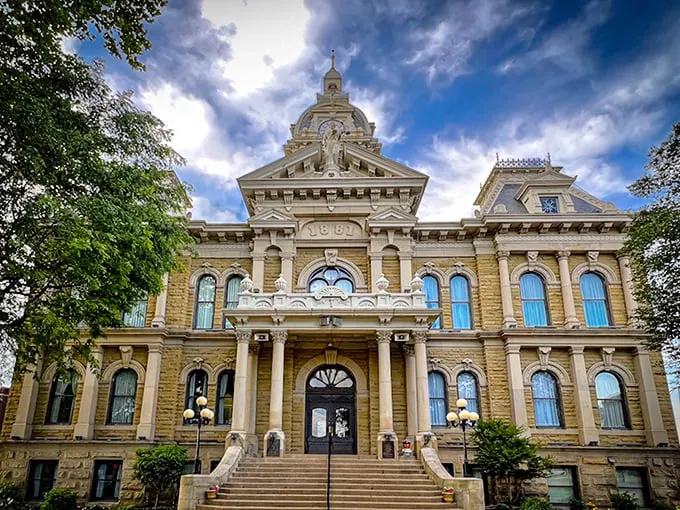 Behold, the Guernsey County Courthouse! This grand dame of architecture has been serving justice and turning heads since 1883. It's like Downton Abbey, but with more legal briefs and fewer British accents.